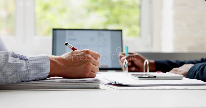 Tax Compliance and Invoice Accounting Using Calculator Stock Image ...