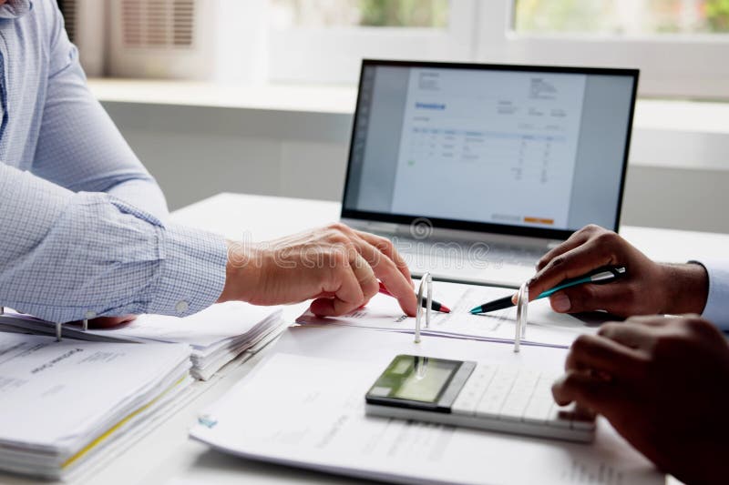 Tax Compliance and Invoice Accounting Using Calculator Stock Photo ...