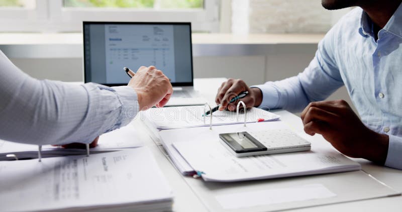 Tax Compliance and Invoice Accounting Using Calculator Stock Photo ...