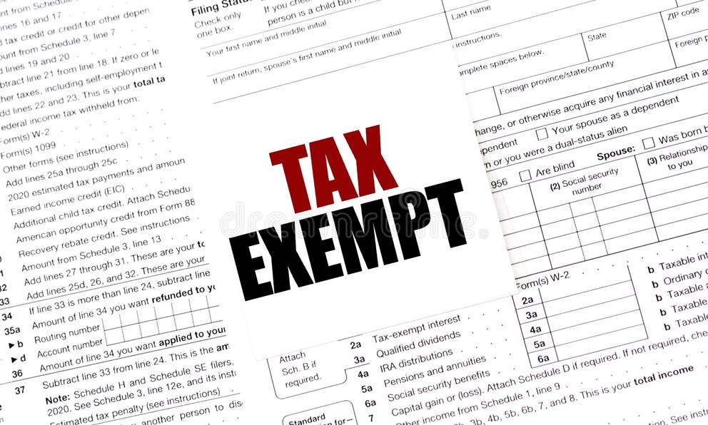 TAX EXEMPT on White Sticker with Tax Forms Stock Image - Image of ...