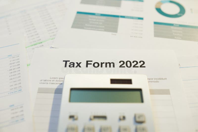 Tax Form 2022 and Calculator at Desk Stock Photo - Image of form, 2023: ...