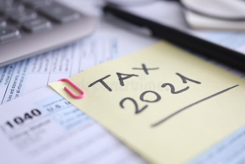 Tax Form for 2021 Calculator and Document are on Table Stock Image ...