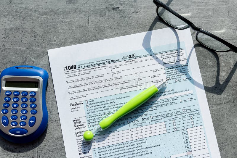 1040 Tax Form, Pen Calculator Glasses on Table Editorial Image - Image ...