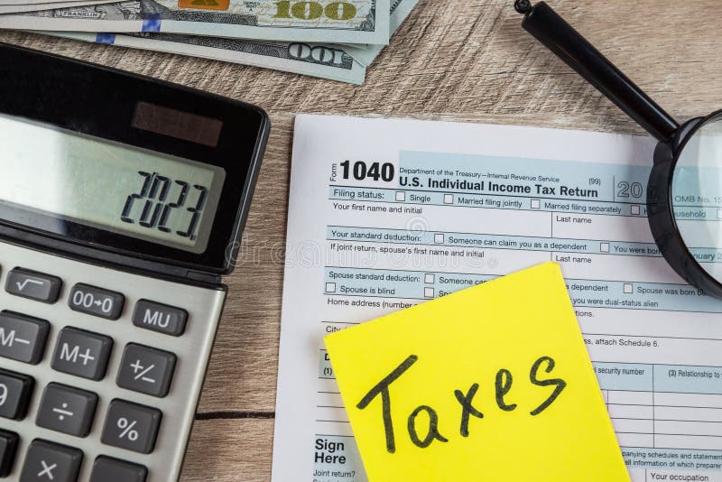 1040 Tax Form on a Wooden Table. Tax Time Editorial Image - Image of ...