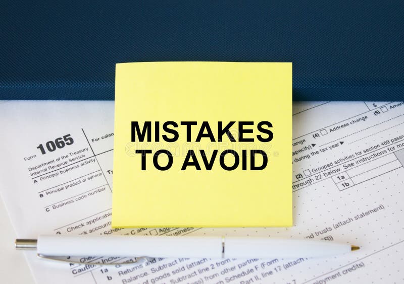Tax Form 1065 with Yellow Sticker with Text Mistakes To Avoid. Notepad ... Tax Form 1065 with Yellow Sticker with Text Mistakes To Avoid. Notepad ...