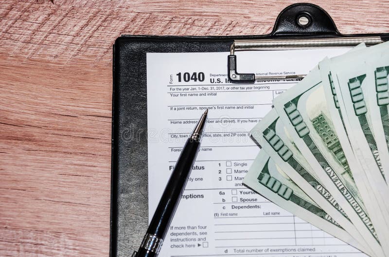 Tax Forms 1040, US Dollars, Pen on Wooden Background Editorial Stock ...