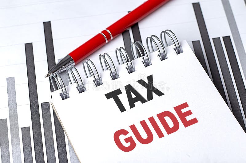 TAX GUIDE Text Written on Notebook with Pen on Chart Stock Photo ...