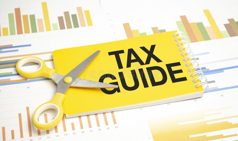 TAX GUIDE. Text on Yellow Notebook and Charts Stock Photo - Image of ...