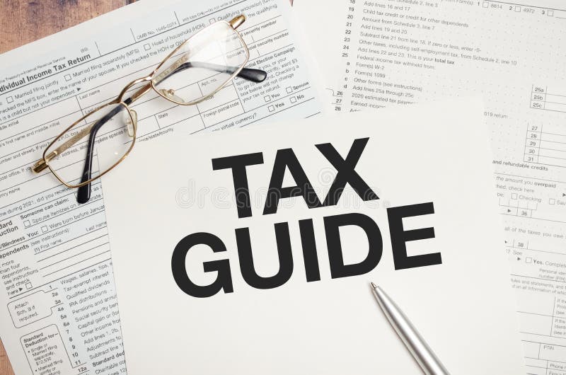 TAX GUIDE Words on Paper with Tax Forms Editorial Photo - Image of help ...