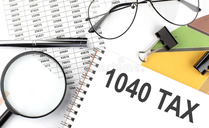 1040 TAX - the Inscription of Text on the Notepad, and Chart. Business ...