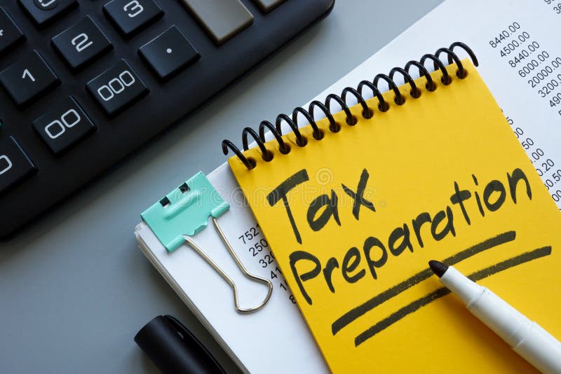 Tax Preparation Concept. Stack of Papers and Calculator. Stock Photo ... Tax Preparation Concept. Stack of Papers and Calculator. Stock Photo ...