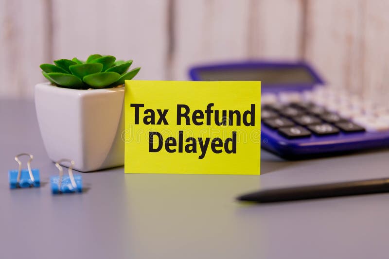 Tax Refund Delayed on Income Tax Form Background with Calculator Stock ...