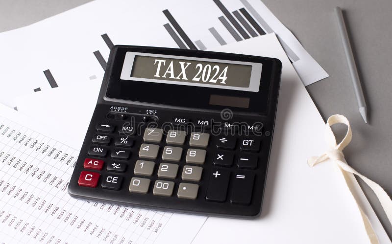 TAX 2024 Text on Calculator with Chart on Grey Background Stock Image ...