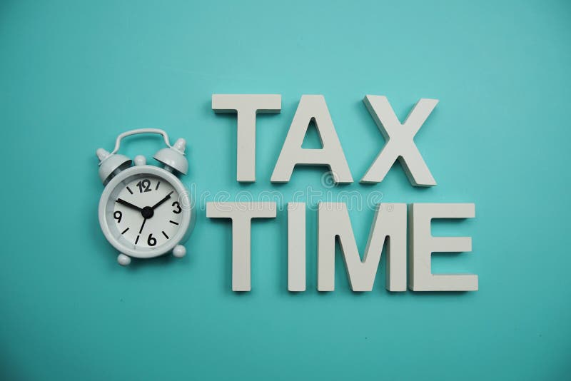 Tax Time Alphabet Letters with Alarm Clock on Blue Background Stock ...
