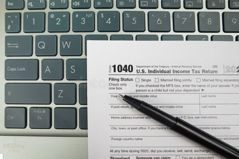 Tax Time - Close-up of US 1040 Tax Return with Hand Editorial Stock ...