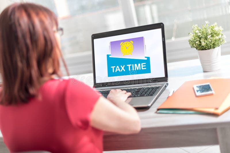 Tax Time Concept on a Laptop Screen Stock Image - Image of clock ...