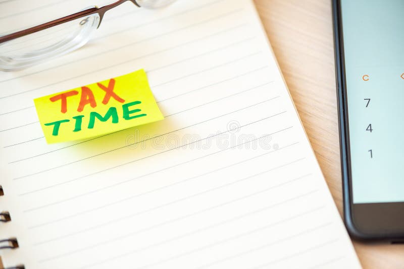 Tax Time Concept on the Sticky Note Paper Stock Photo - Image of april ...