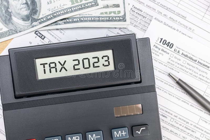 Tax Time 2023 Concept. Text on Calculator Screen, Tex Forms and Dollar ...