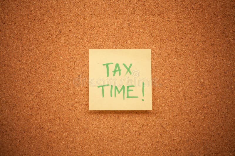 Tax Time Note on a Cork Board Stock Photo - Image of income, sign: 95838124