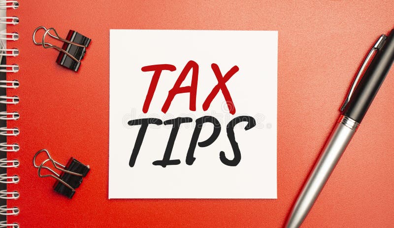 TAX TIPS Sign on Sheet of Paper on the Red Notepad with Pen Stock Photo ...