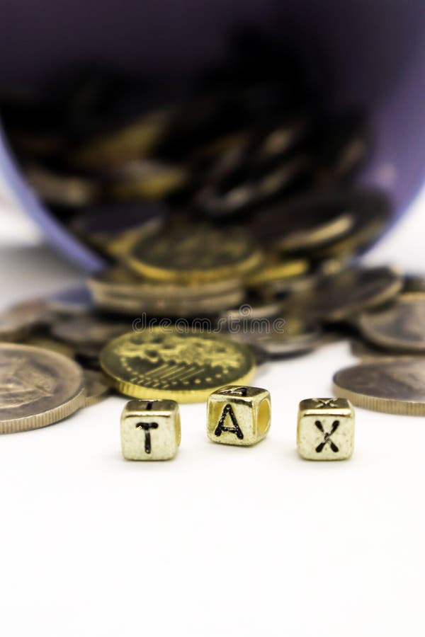 â€œTAXâ€ Wording on a Stack of Coins Stock Photo - Image of currency ...