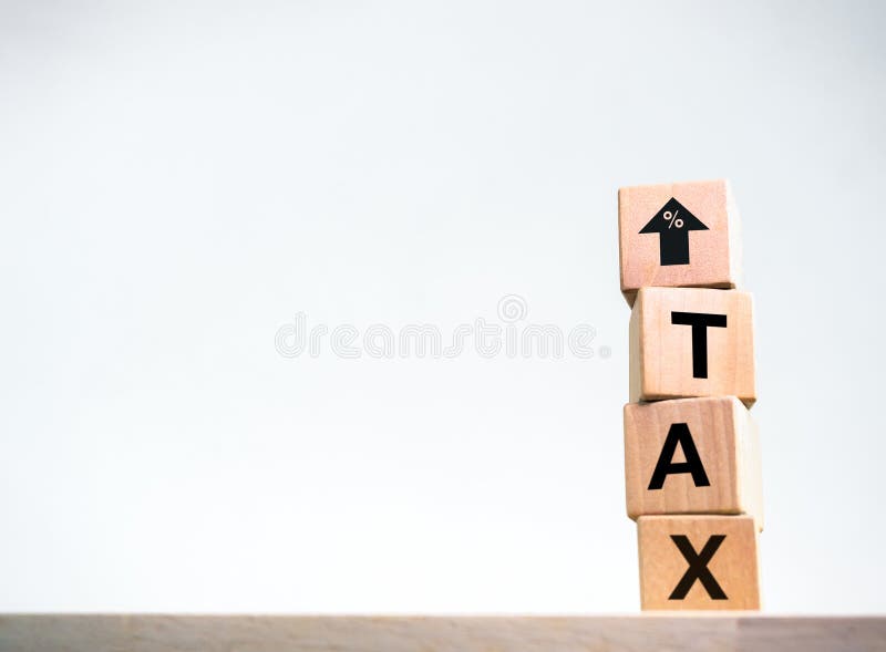 Percentage in Up Arrow Sign and Text "TAX" on Wooden Cube Blocks Stack ...