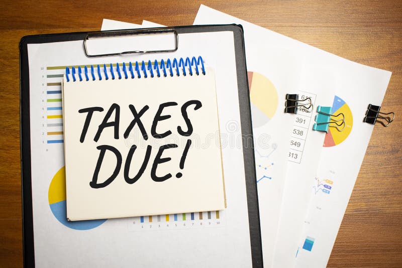 TAXES DUE is Written on a Notepad on an Office Desk Stock Image - Image ...