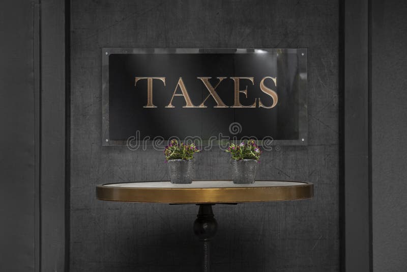 Taxes sign board on wall stock image. Image of marketing - 169771099