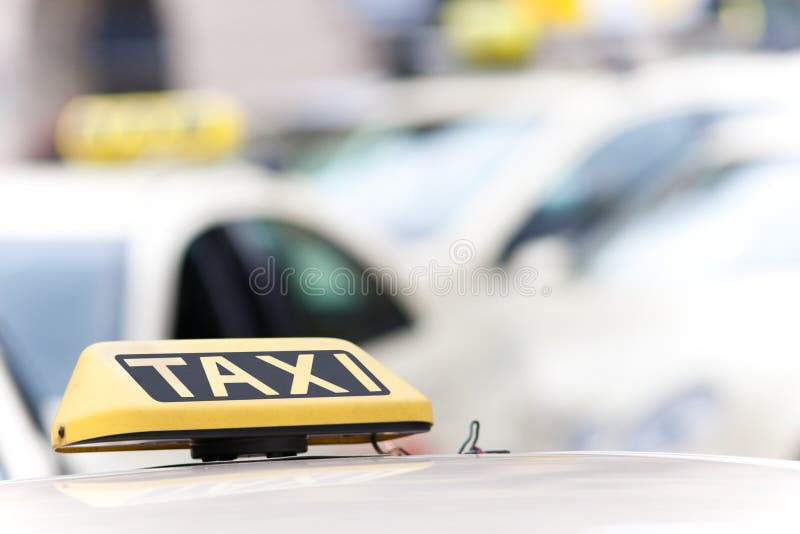Taxi cab signs on vehicles stock photo. Image of cars - 8811798