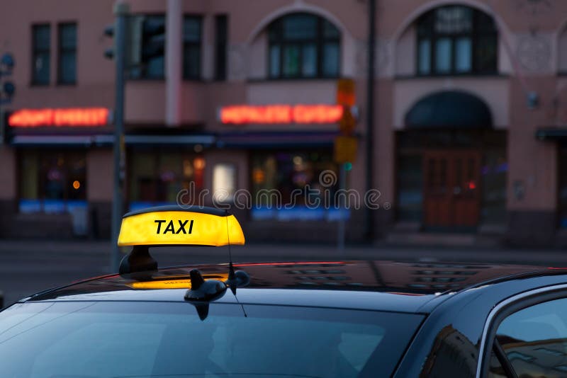 Taxi cap on a car roof stock photo. Image of transport - 47559200