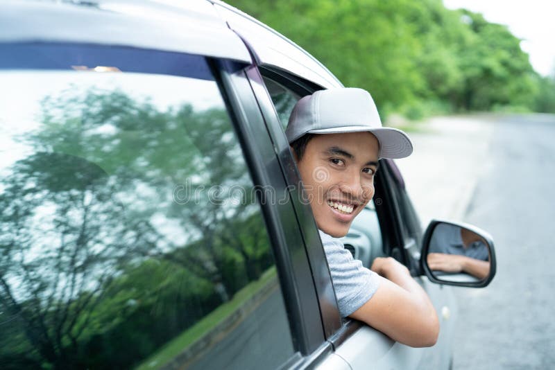 Taxi Driver Look Back from the Open Windows Stock Photo - Image of ...