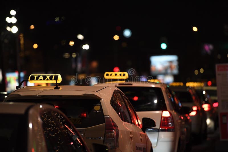 Taxi line up at night stock image. Image of travel, evening - 184119995