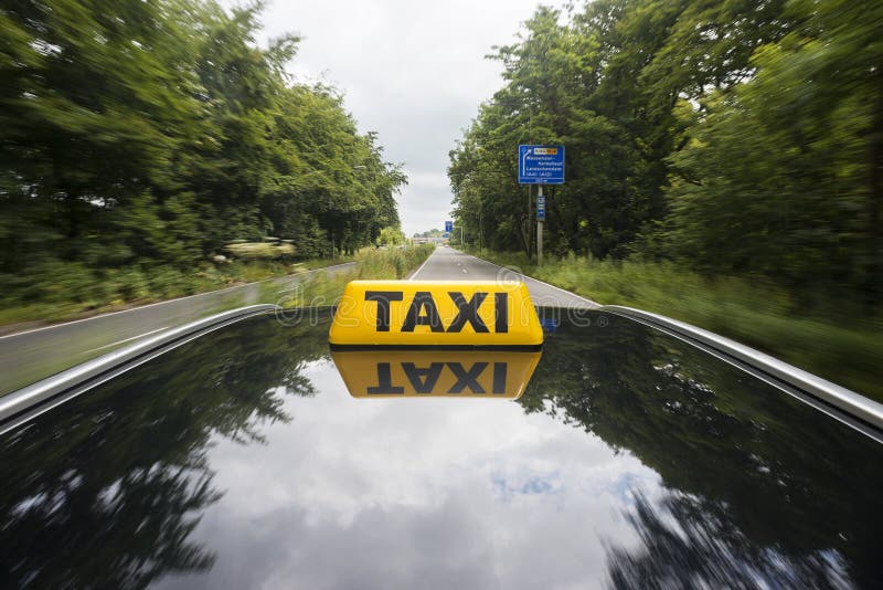 Taxi sign stock photo. Image of taxi, outdoors, dual - 25721884