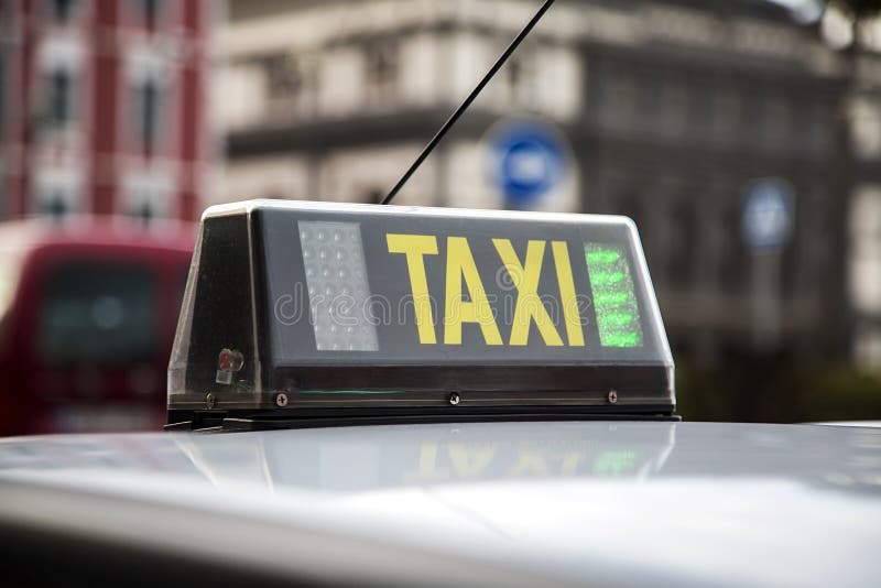 Taxi sign stock image. Image of street, auto, transportation - 74876639