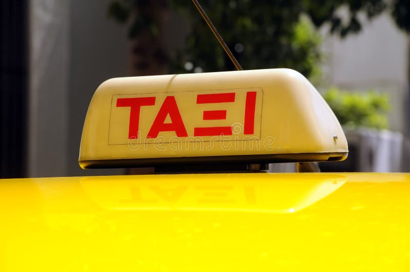 Taxi Sign in the Greek Language Stock Photo - Image of language, text ...