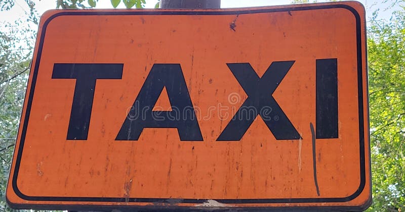 Taxi Sign on Orange Plate în Daylight. Stock Photo - Image of taxi ...