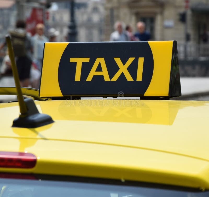 Taxi sign stock photo. Image of side, city, black, outdoors - 55643390