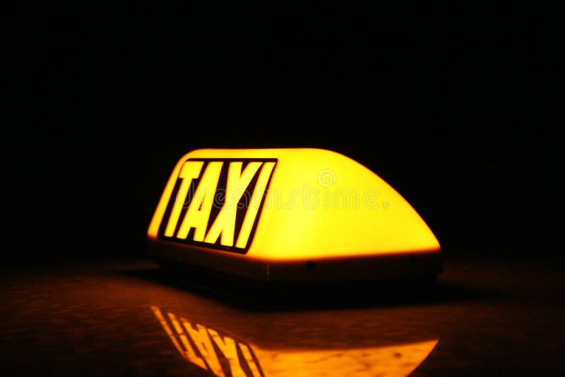 Taxi yellow sign stock photo. Image of transportation - 5637232