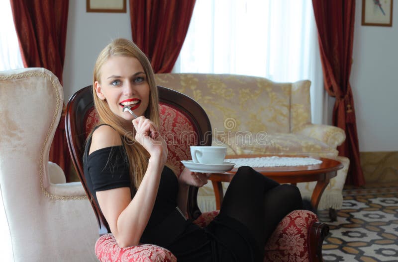 Woman having tea stock image. Image of beautiful, young - 11329945