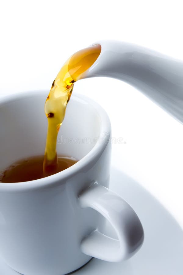 Teapot pouring tea stock photo. Image of ceramic, pouring - 3848016