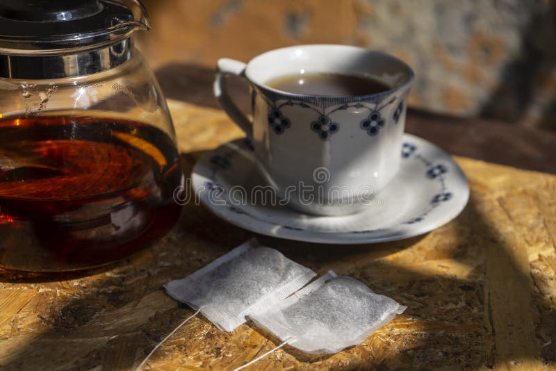 Tea Background with Teapot and Tea Bag on Blur Background Stock Photo ...