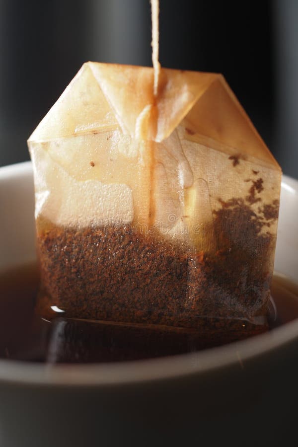 Tea Bag Steeping in Warm Cup of Black Tea by the Window Stock Image ...