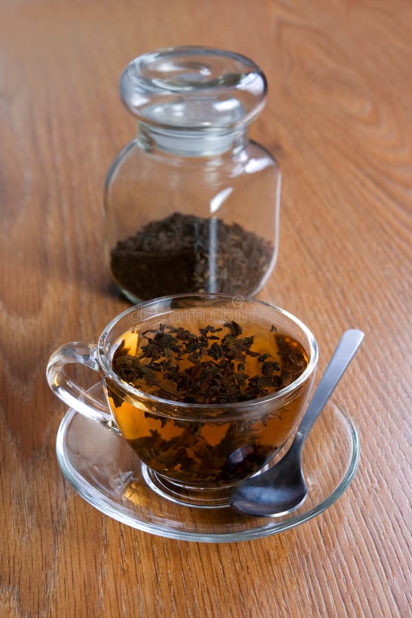Tea brewed in a cup stock image. Image of wood, herbs - 18369785