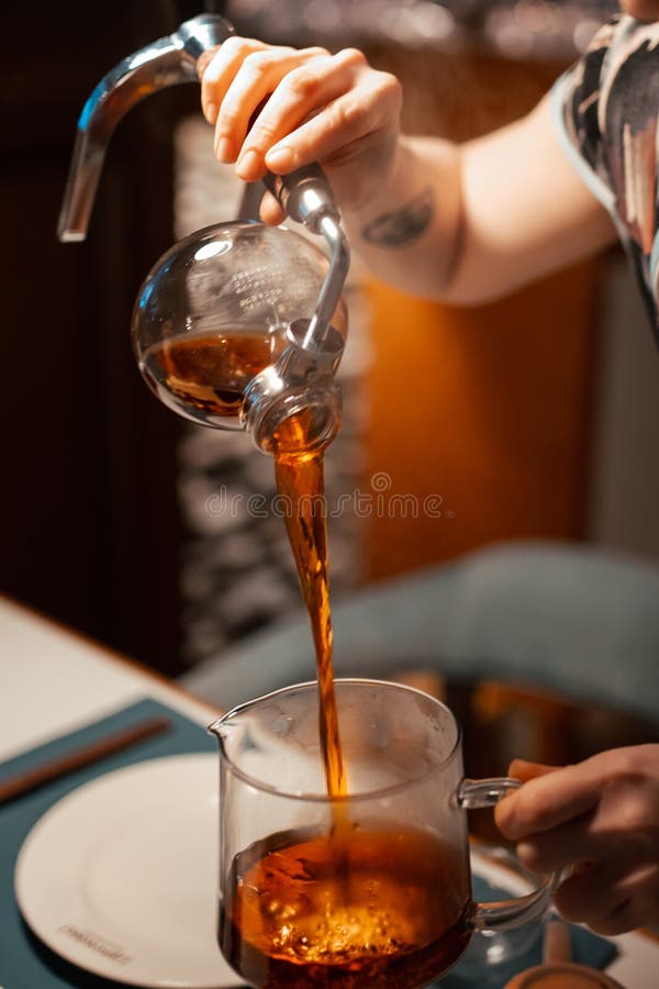 Tea is Brewed in a Tea Siphon in a Restaurant. Stock Image - Image of ...