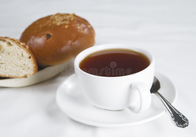 Tea and bun stock photo. Image of drink, white, breakfast - 18480356