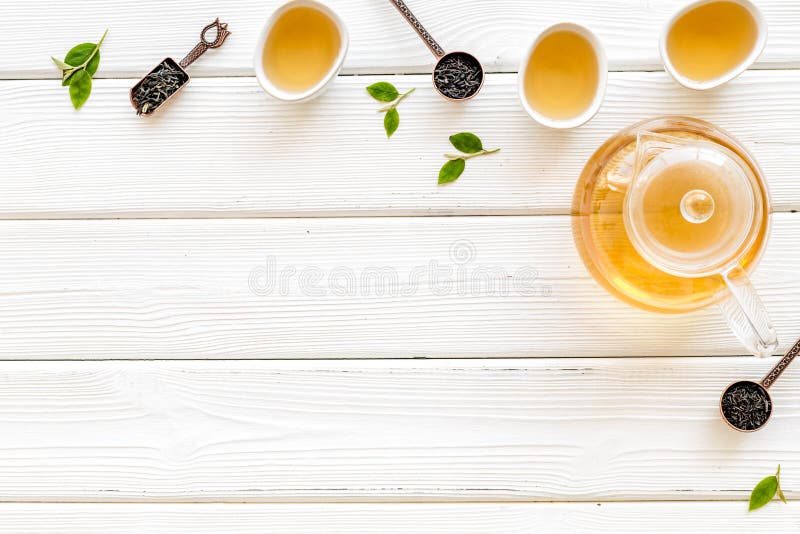 Tea Ceremony Concept. Hot and Dry Tea in Teapot and Cups, Top View ...