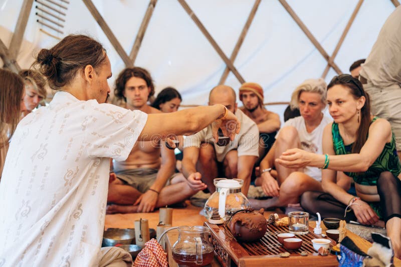 Tea Ceremony. People Sit in a Circle and Taste Tea. Ancient Traditions ...