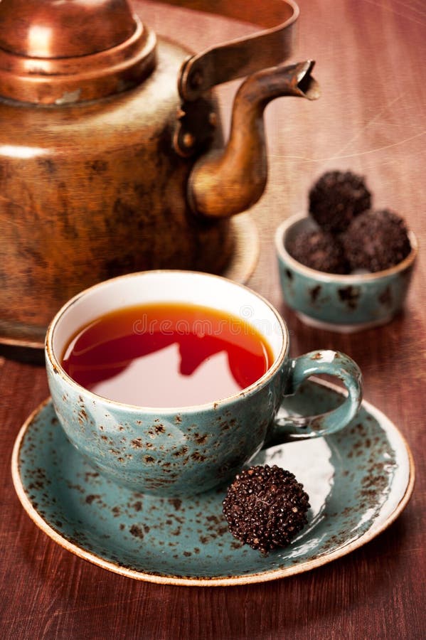 Tea and Chocolate Candies in a Vintage Style Stock Image - Image of ...