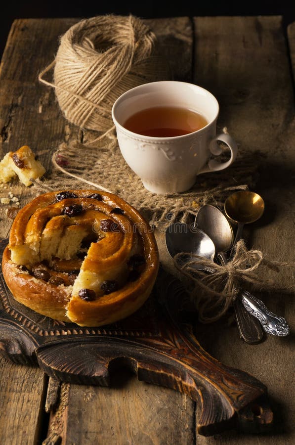 Tea with Cinnamon Buns and Raisin Stock Image - Image of brunch, fork ...