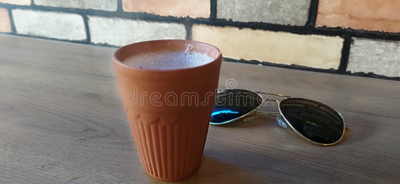 Tea in Clay Glass on Table with Goggles Stock Image - Image of table ...